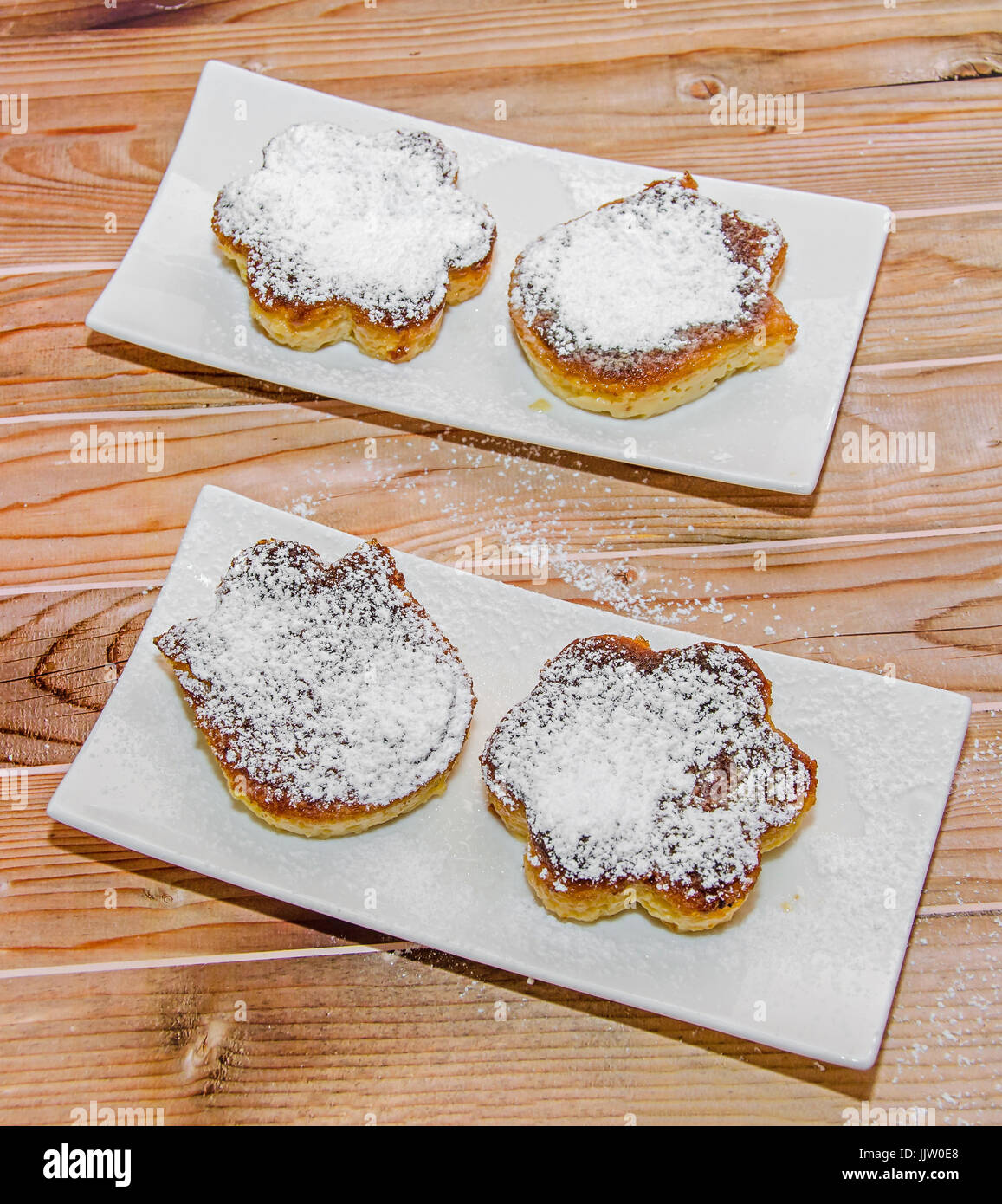 Homemade Creme brulee with powder sugar, burnt cream, crema catalana ...