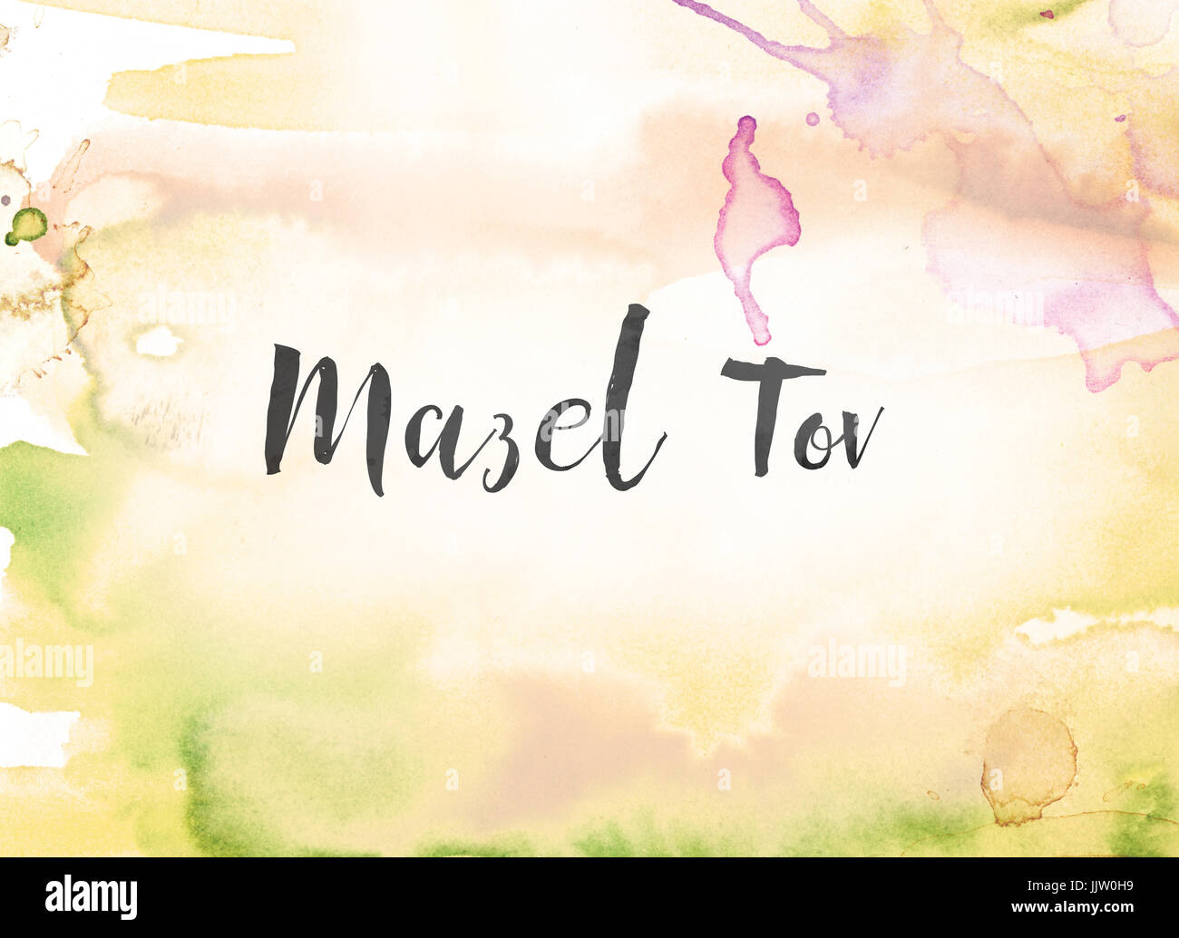 The words Mazel Tov concept and theme written in black ink on a ...