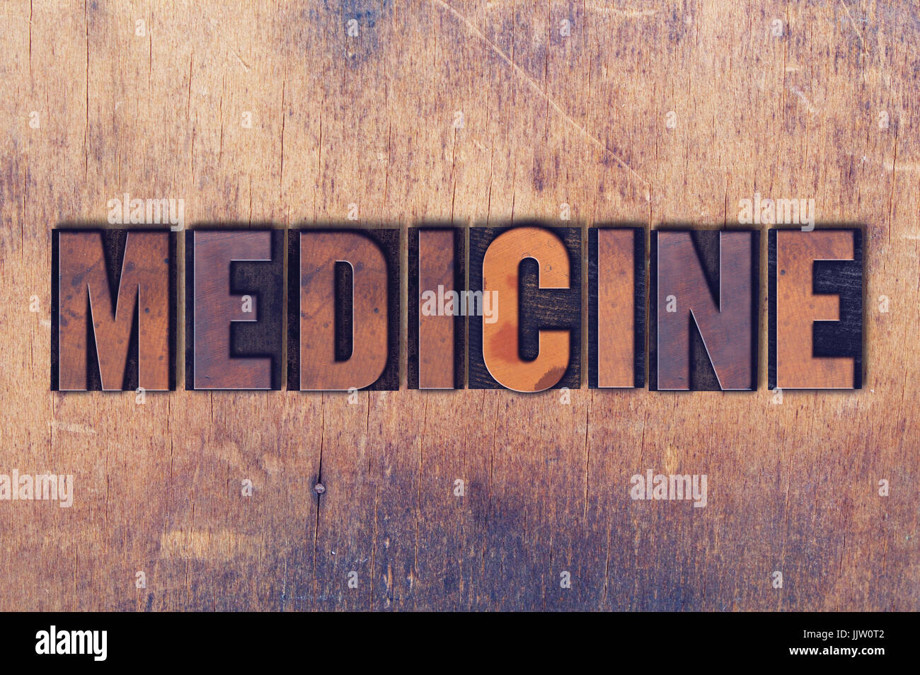 The word Medicine concept and theme written in vintage wooden ...