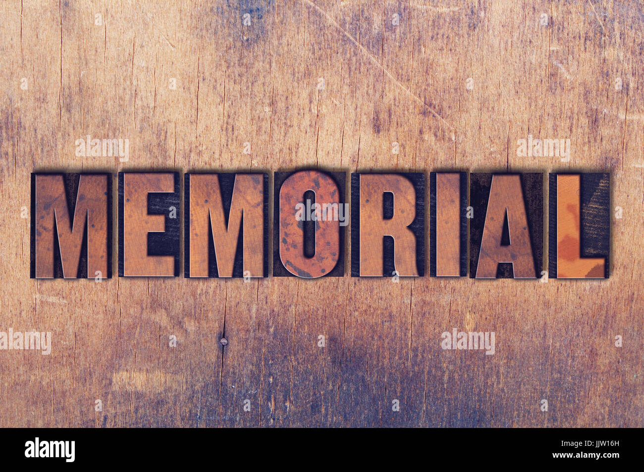 The word Memorial concept and theme written in vintage wooden ...