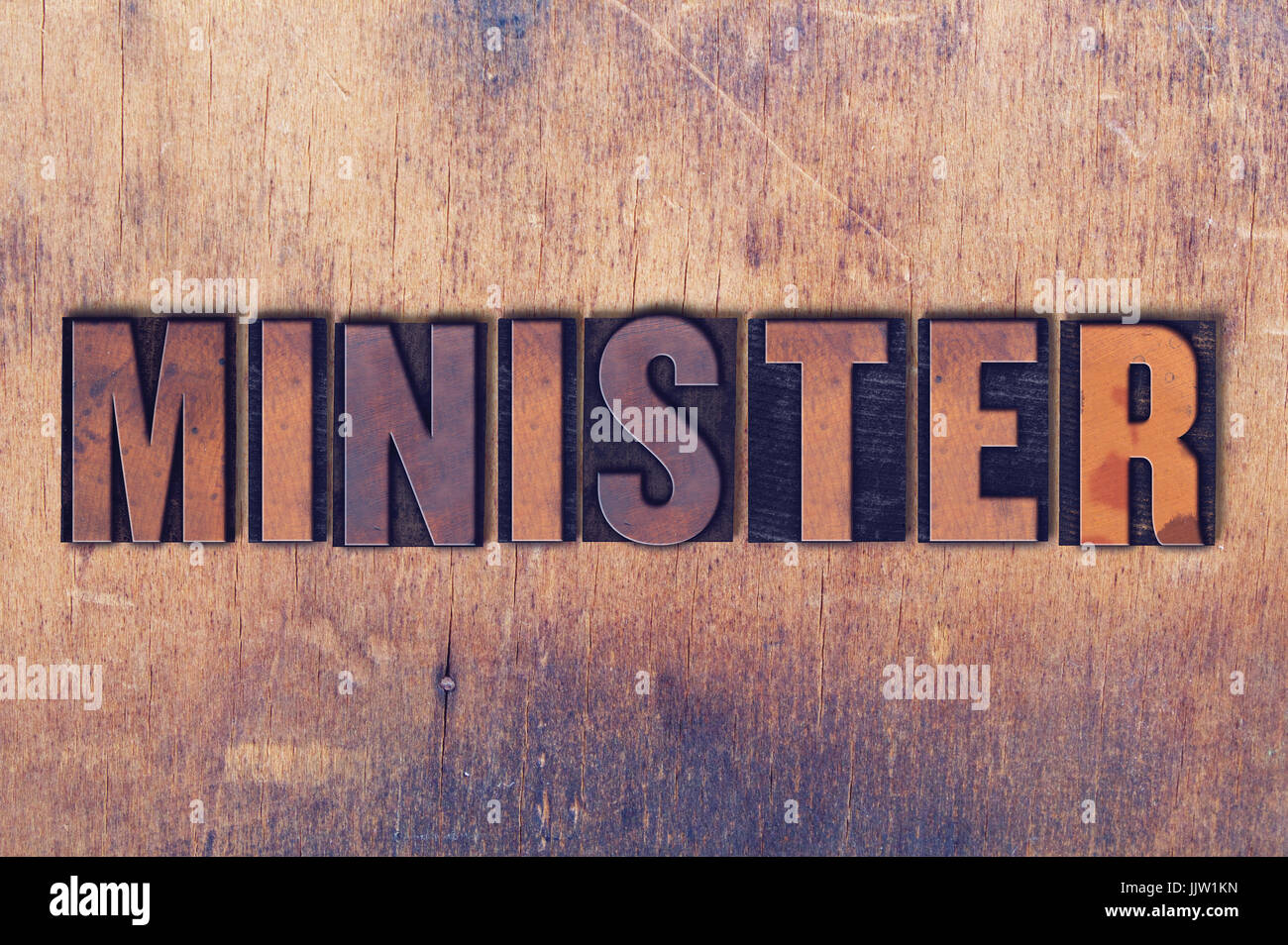 The word Minister concept and theme written in vintage wooden ...