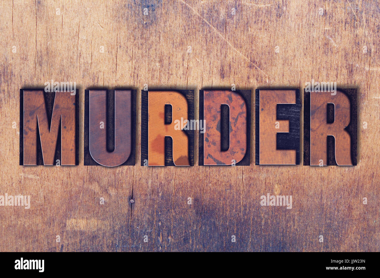 The word Murder concept and theme written in vintage wooden letterpress ...