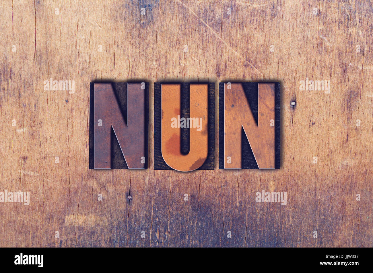 The word Nun concept and theme written in vintage wooden letterpress ...