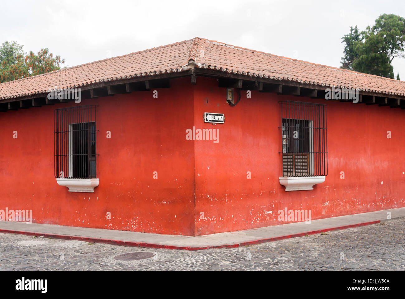 Corner perspective colonial house with barred windows in Antigua ...
