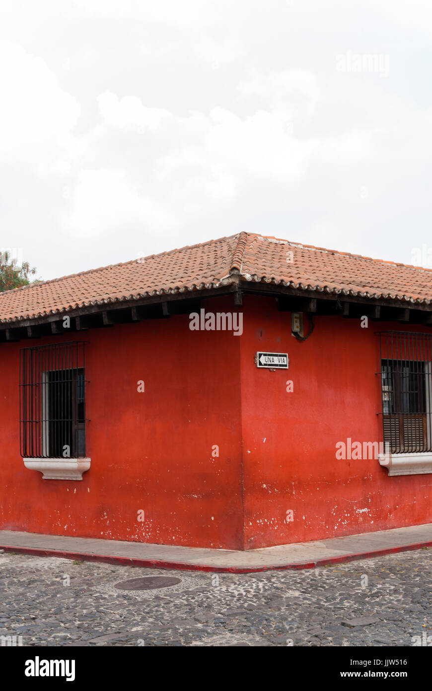 Corner perspective colonial house with barred windows in Antigua ...
