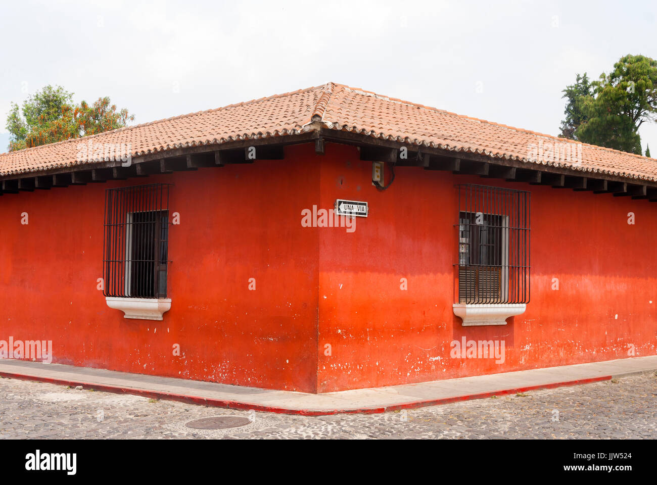 Corner perspective colonial house with barred windows in Antigua ...