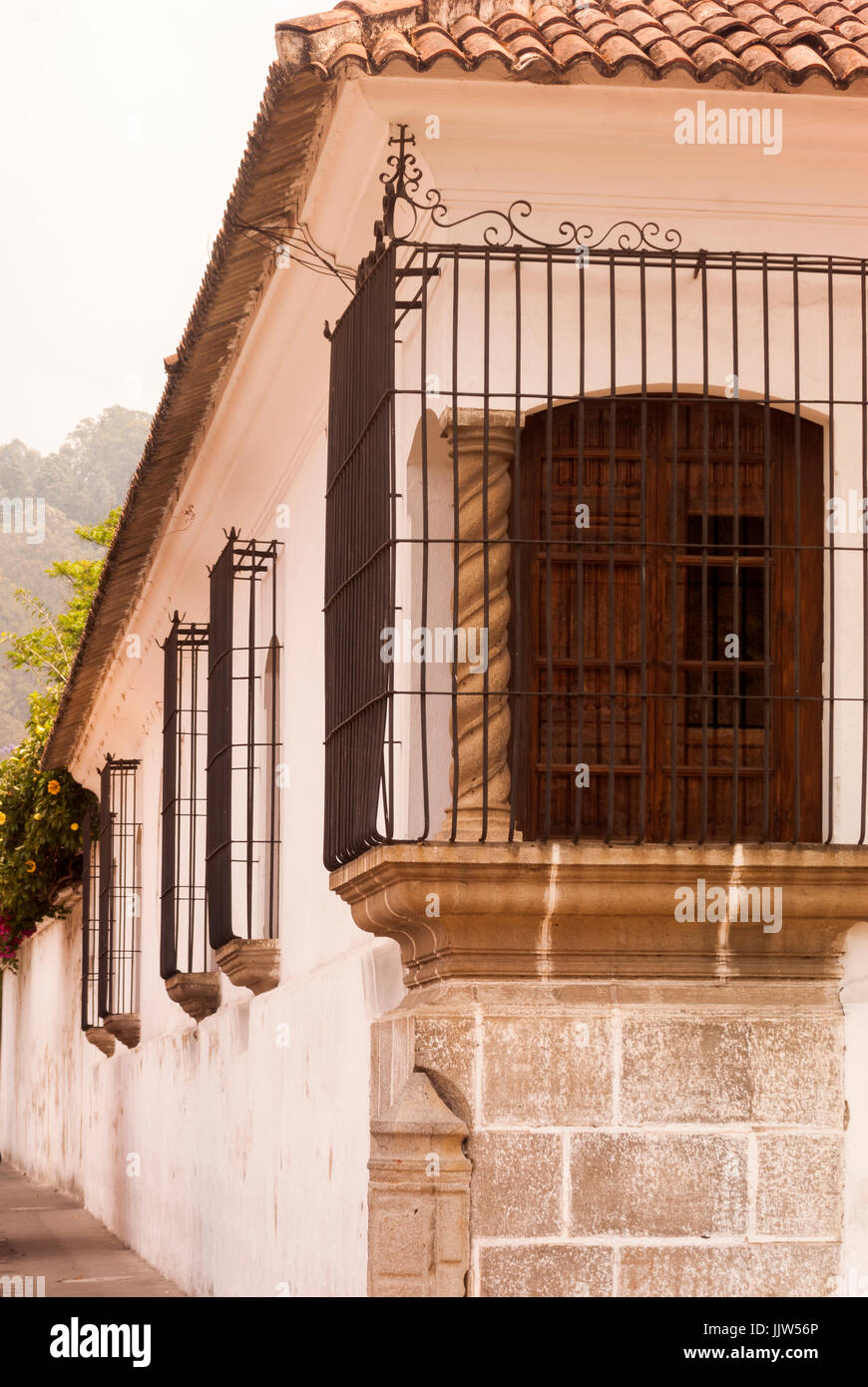 Corner perspective colonial house with barred windows in Antigua ...