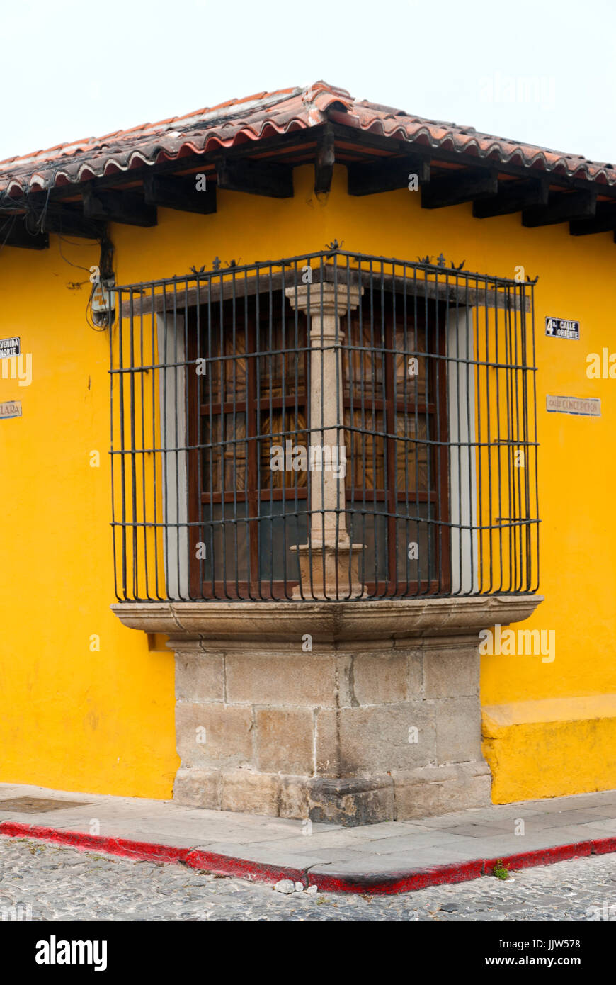 Corner perspective colonial house with barred windows in Antigua ...