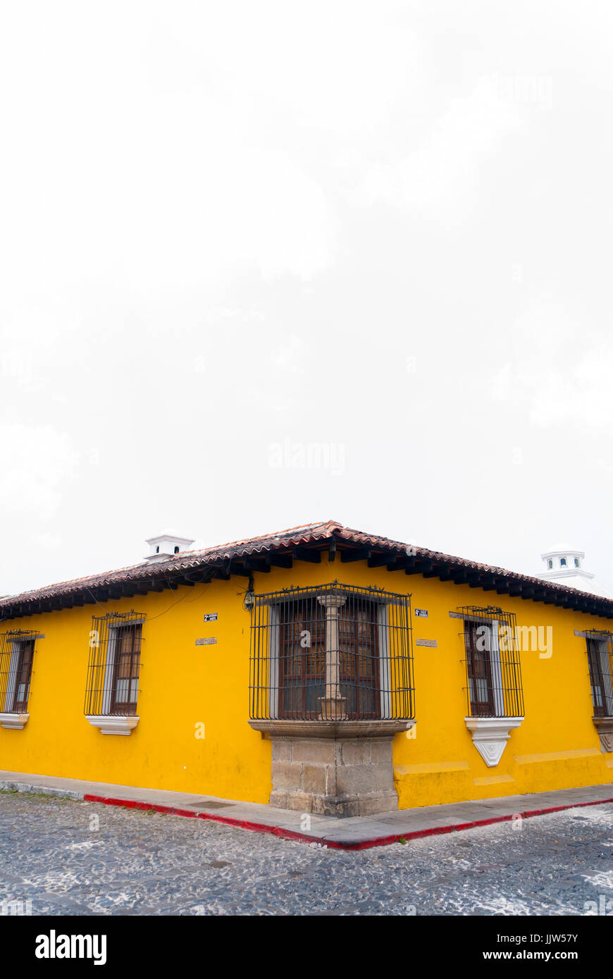 Corner perspective colonial house with barred windows in Antigua ...
