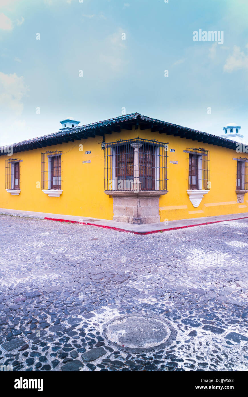 Corner perspective colonial house with barred windows in Antigua ...