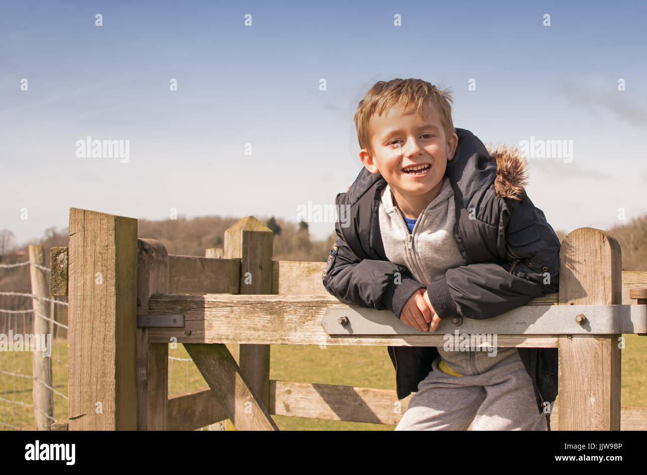 Boy On A Gate High Resolution Stock Photography and Images - Alamy