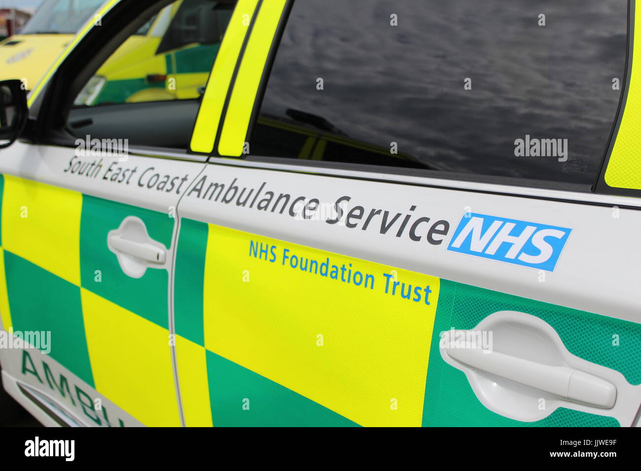 SIDE ON CLOSE PICTURE OF SIDE OF SOUTH EAST COAST AMBULANCE SERVICE NHS ...