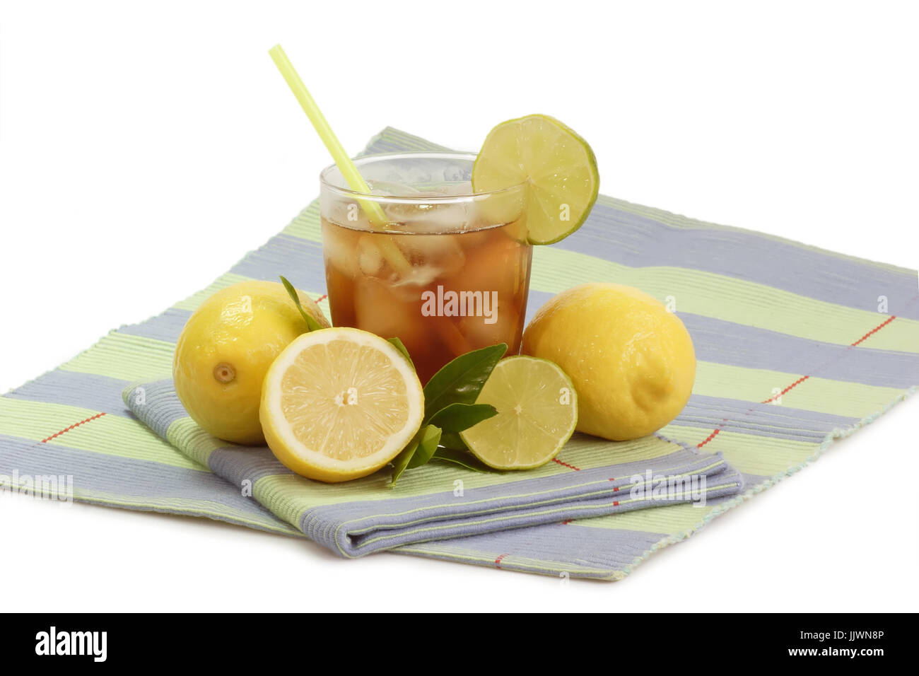 A glass full of Ice Tea with a lemon slice on bright background Stock ...