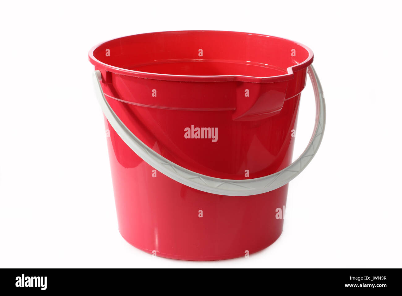 A red bucket or pale on a white background Stock Photo - Alamy