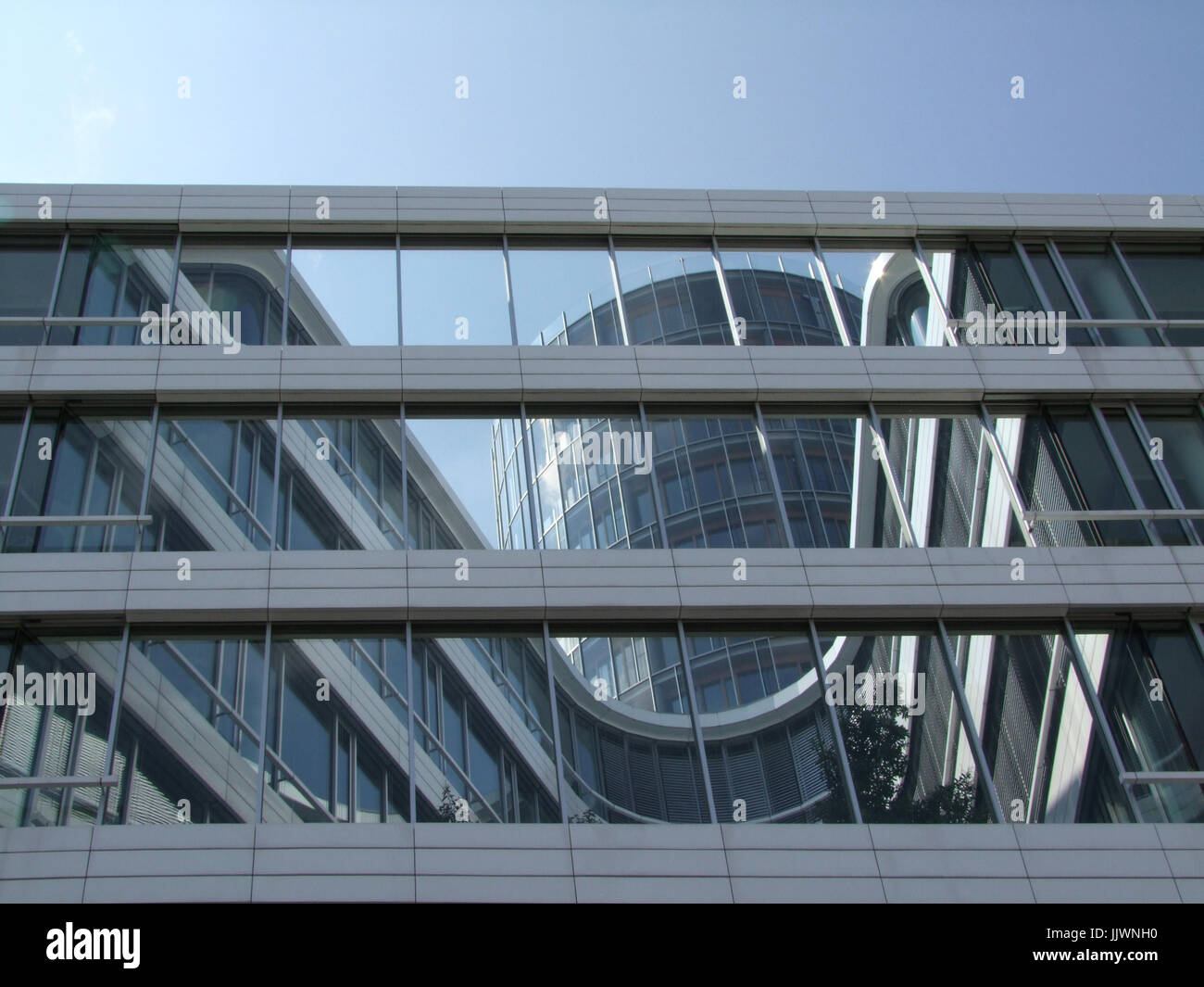 Modern architecture with glass windows Stock Photo - Alamy