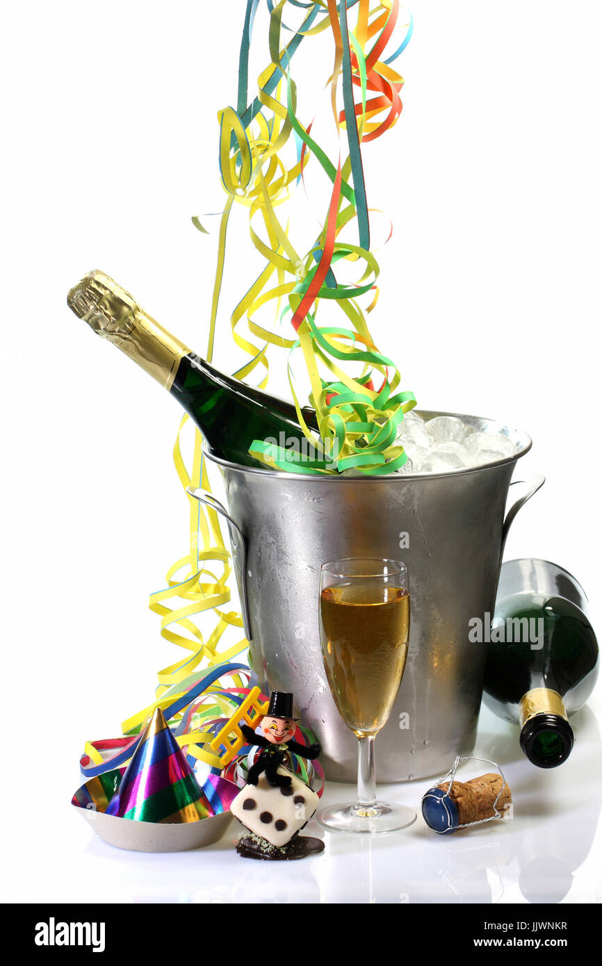 Champagne toast composition with glas, talisman and decoration on ...