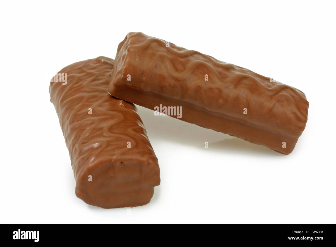 Candy bar on bright background Stock Photo - Alamy