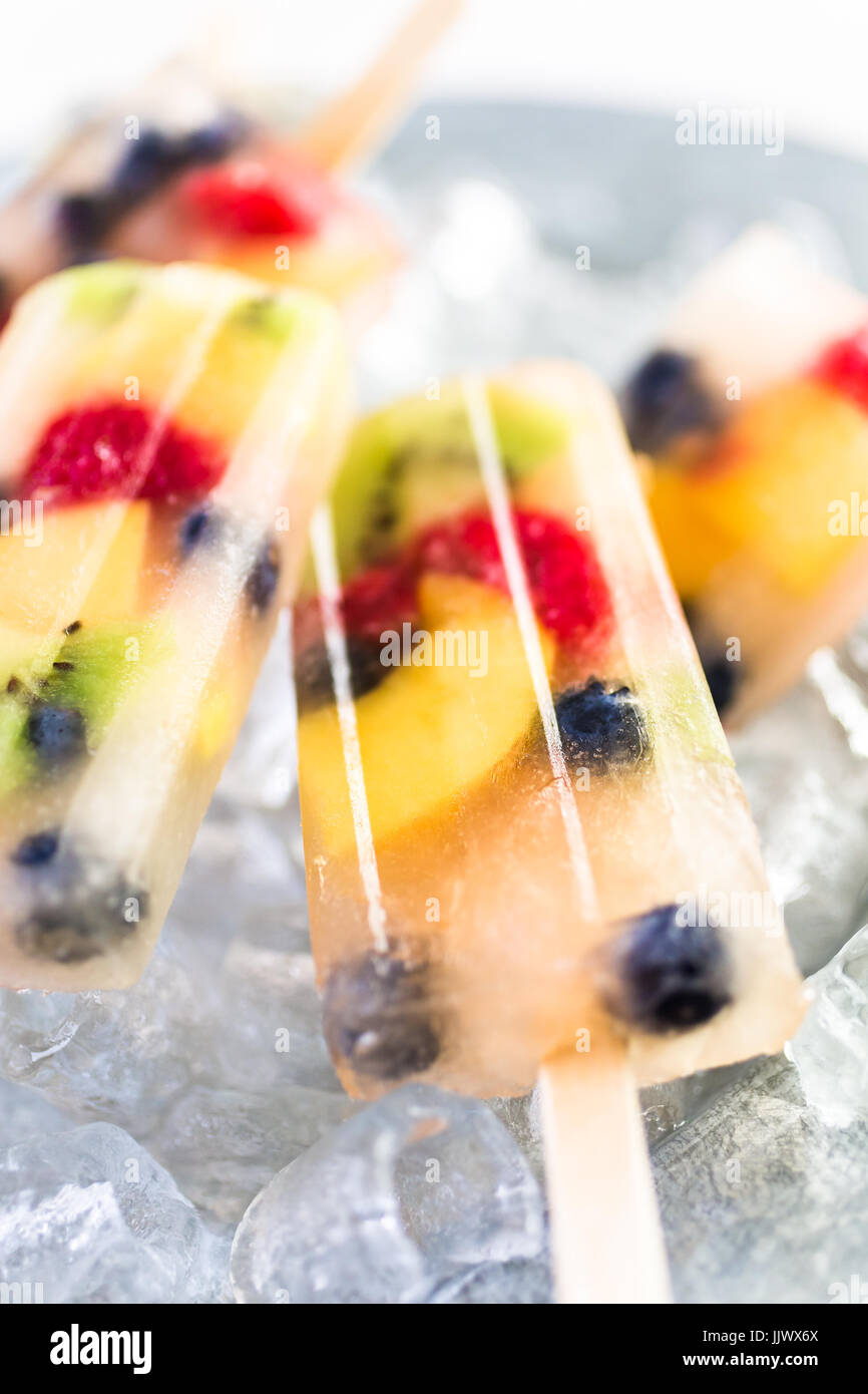 Homemade fresh fruit popsicles with apple juice Stock Photo - Alamy