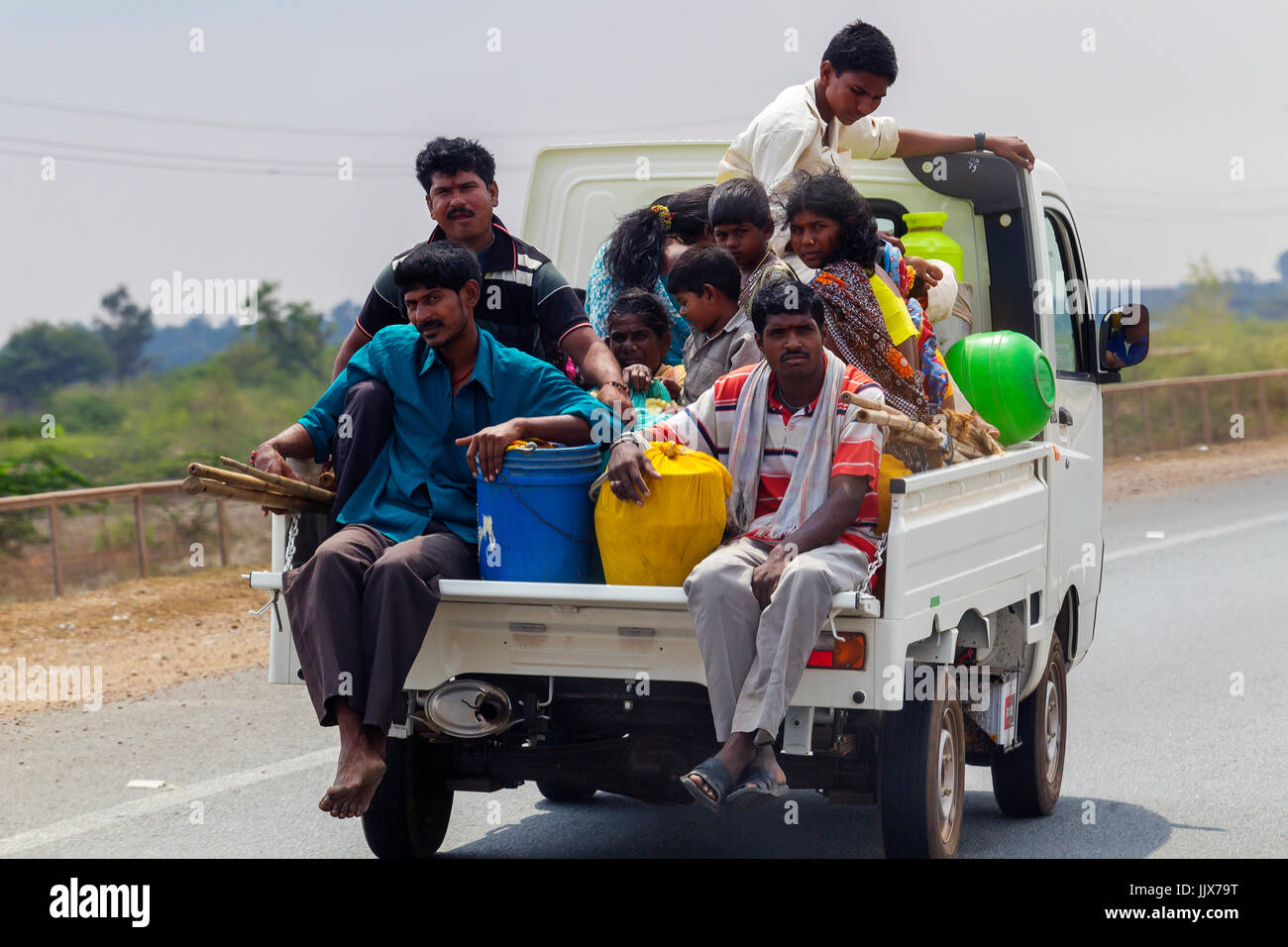 Indians being transported on a small truck, Karnataka, India Stock ...