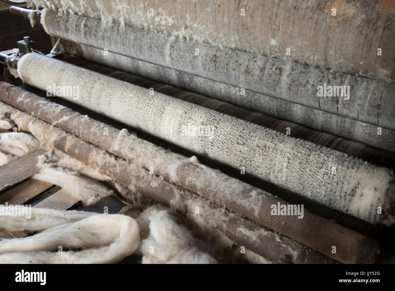 Close up of wool in vintage textile machinery inside old factory Stock ...