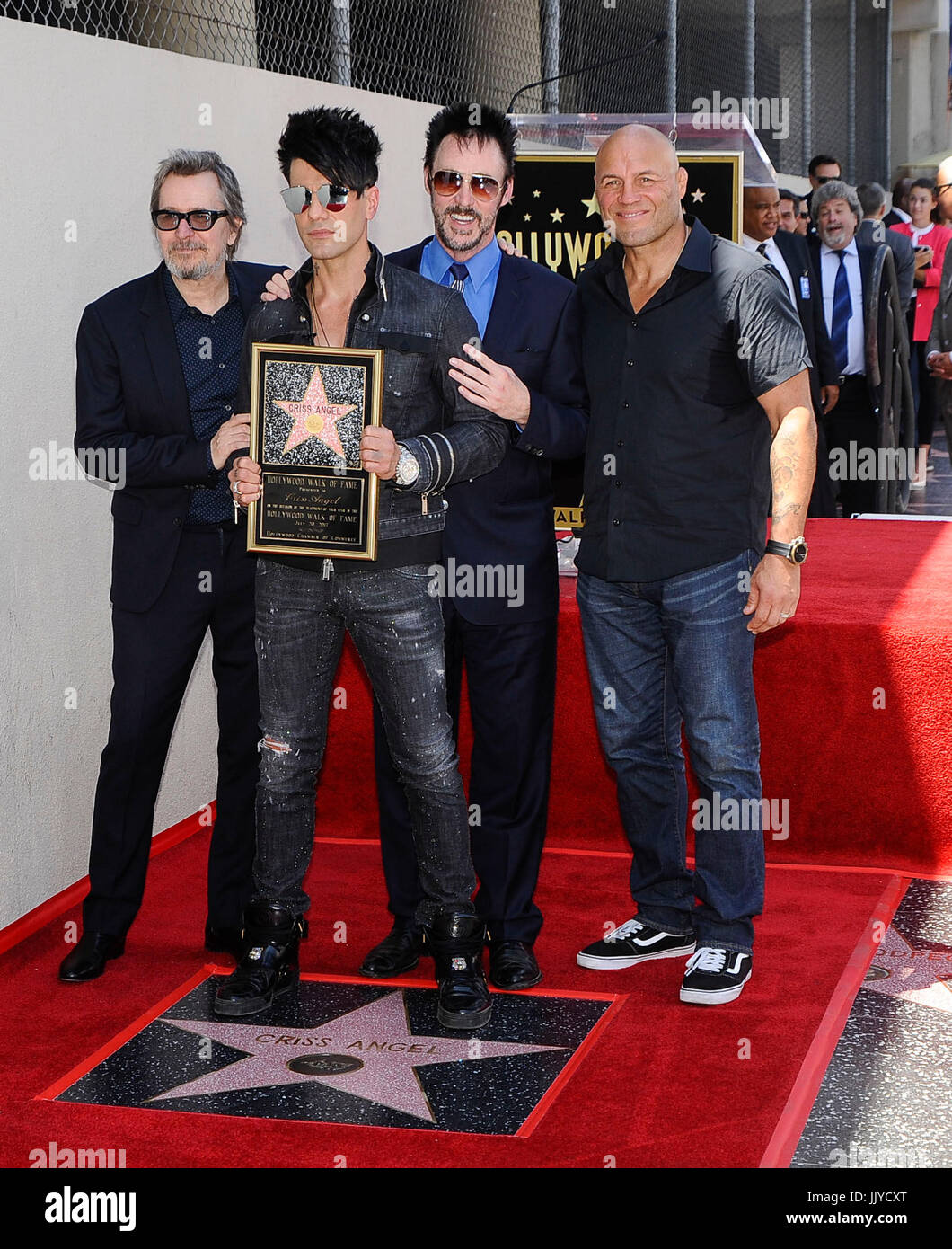 Los Angeles, USA. 20th July, 2017. Magician Criss Angel (2nd L) poses ...