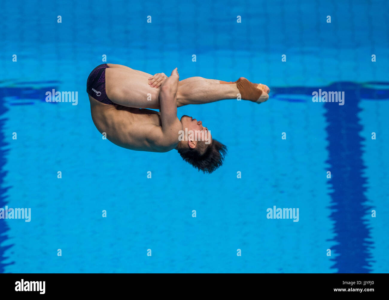Yuan Cao from China at the men's 3m springboard diving final during the ...
