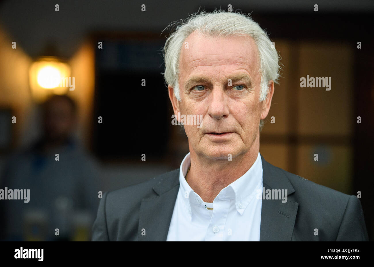 Moenchengladbach's vice president Rainer Bonhof looks on as the players ...
