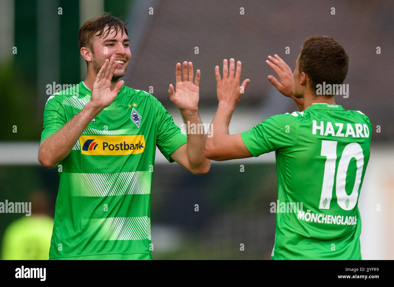 Moenchengladbach's Thorgan Hazard (R) celebrates his 1-0 goal with ...