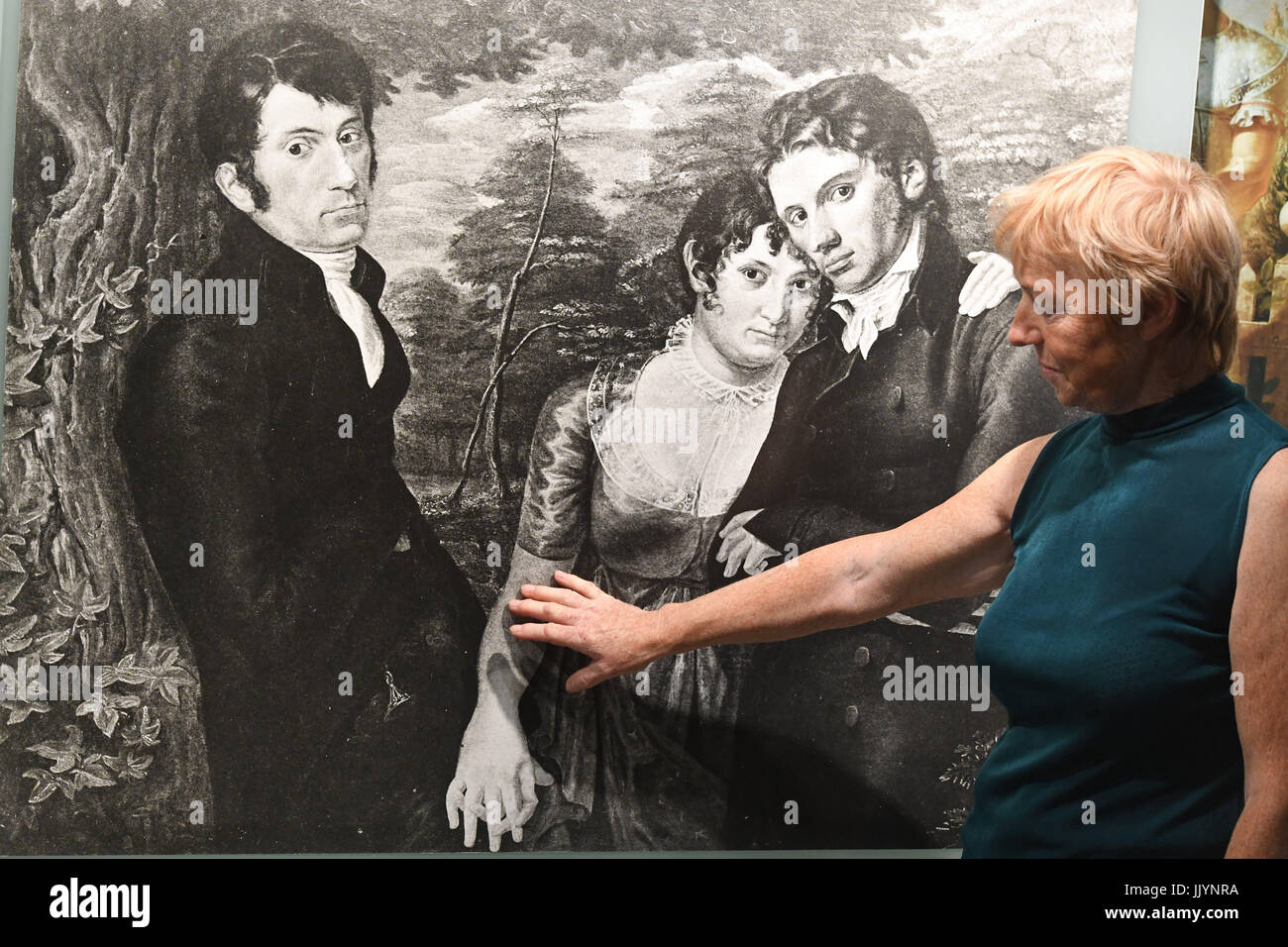 The head of the museum Barbara Roggow can be seen pointing at a ...