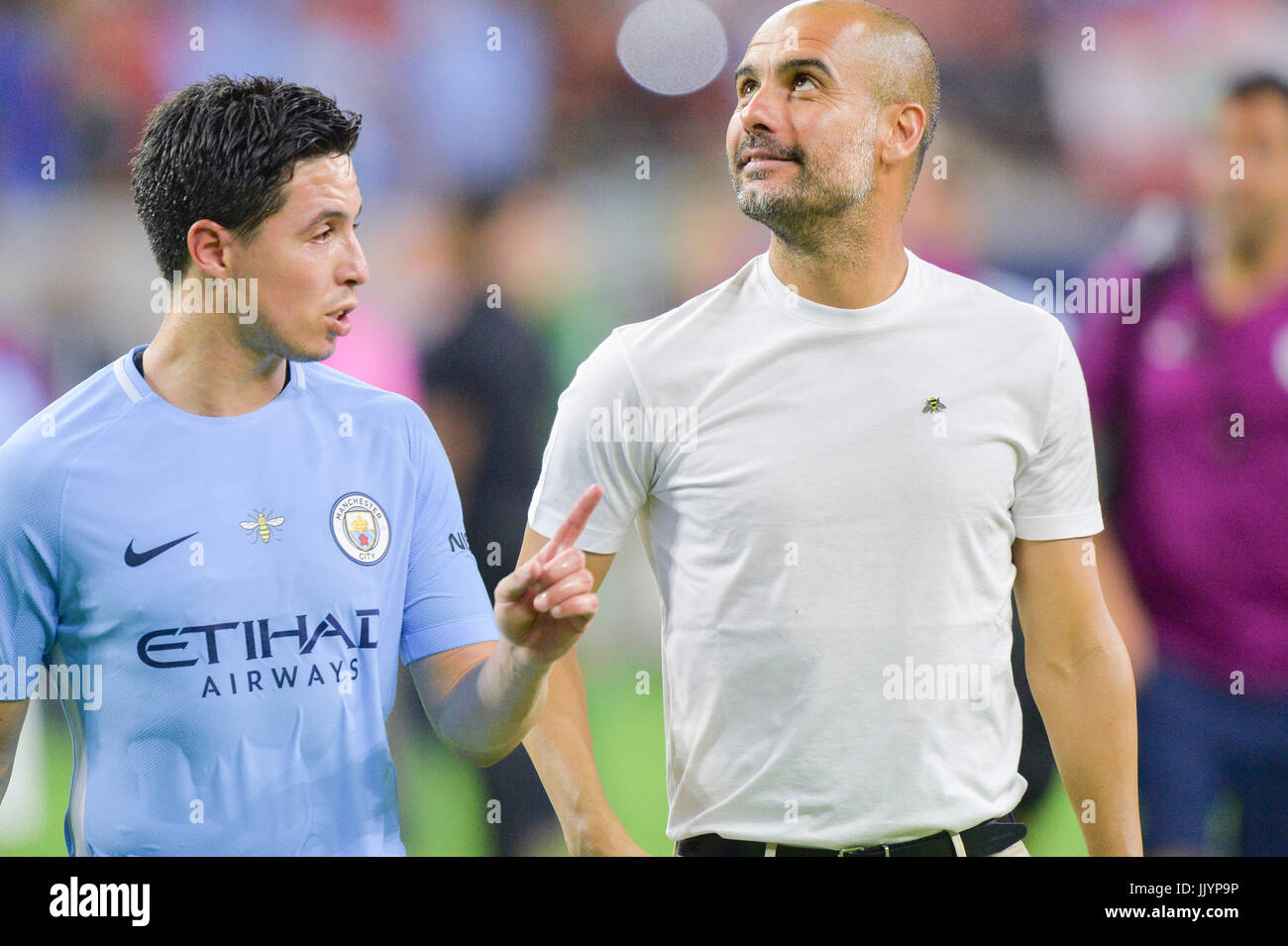 20 July 2017 - Pep Guardiola leaves the pitch after the International ...