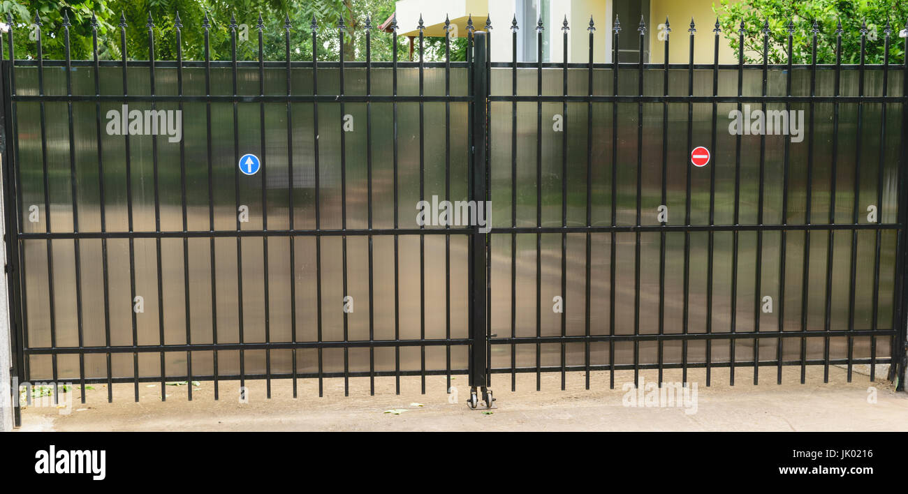 urban residential private property car access gate made from steel ...