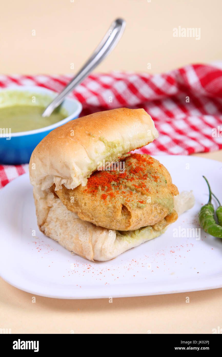 Indian special traditional fried food vada pav Stock Photo - Alamy