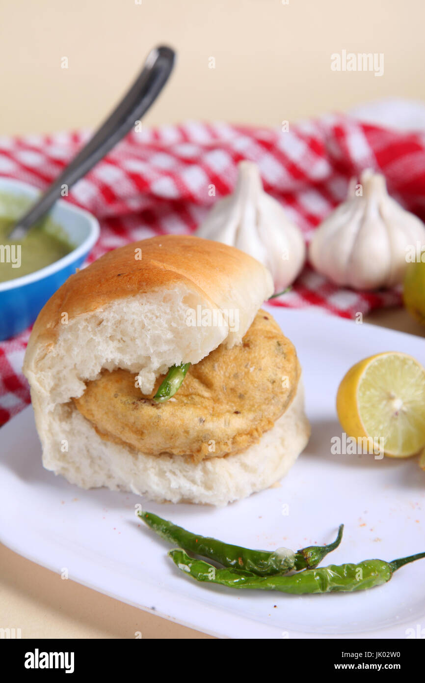 Indian special traditional fried food vada pav Stock Photo - Alamy