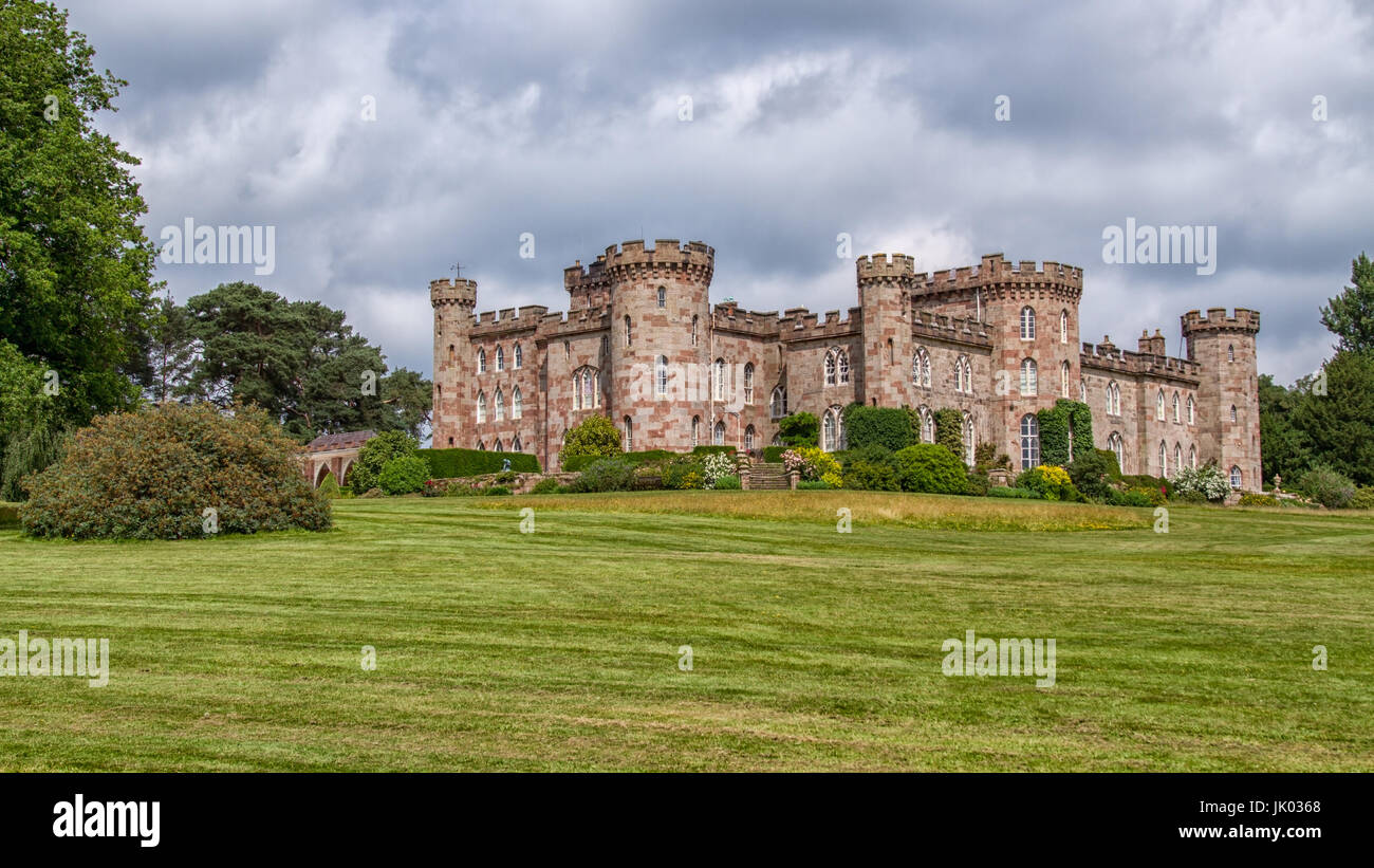 Country landscape showing an english castle standing in its grounds ...