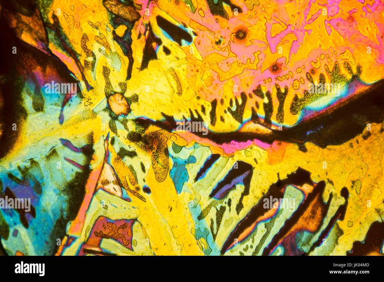 colorful microscopic shot of salt acid microcrystals in polarized light ...