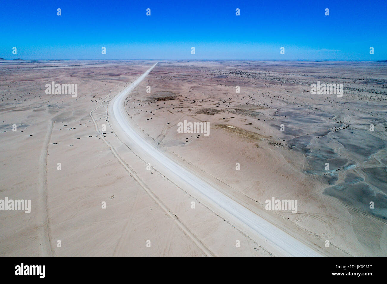 Aerial view of the road running through the Namib desert in Namibia ...
