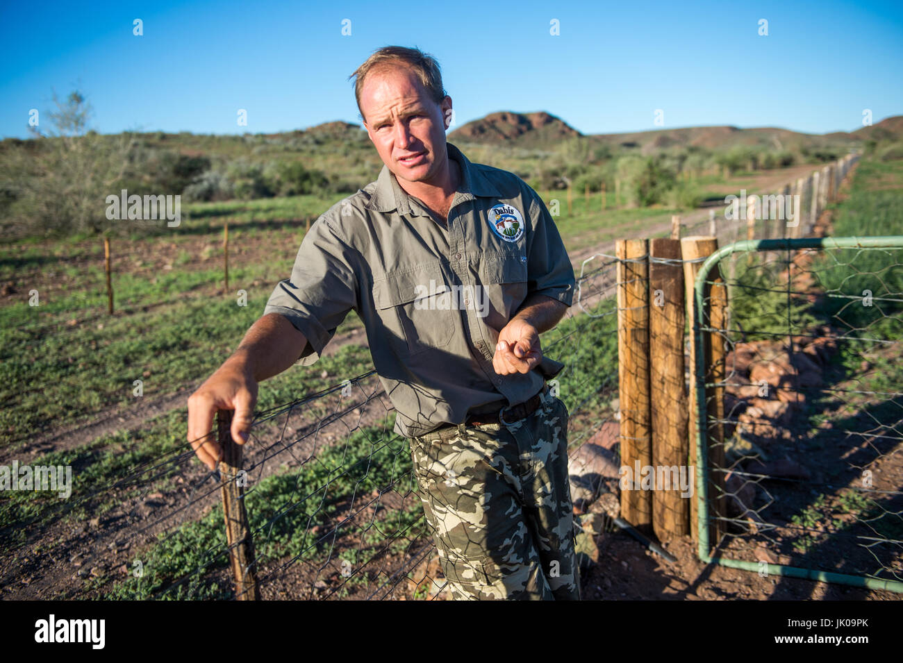 Farmer shows off fencing system in Helmeringhausen, southern Namibia ...