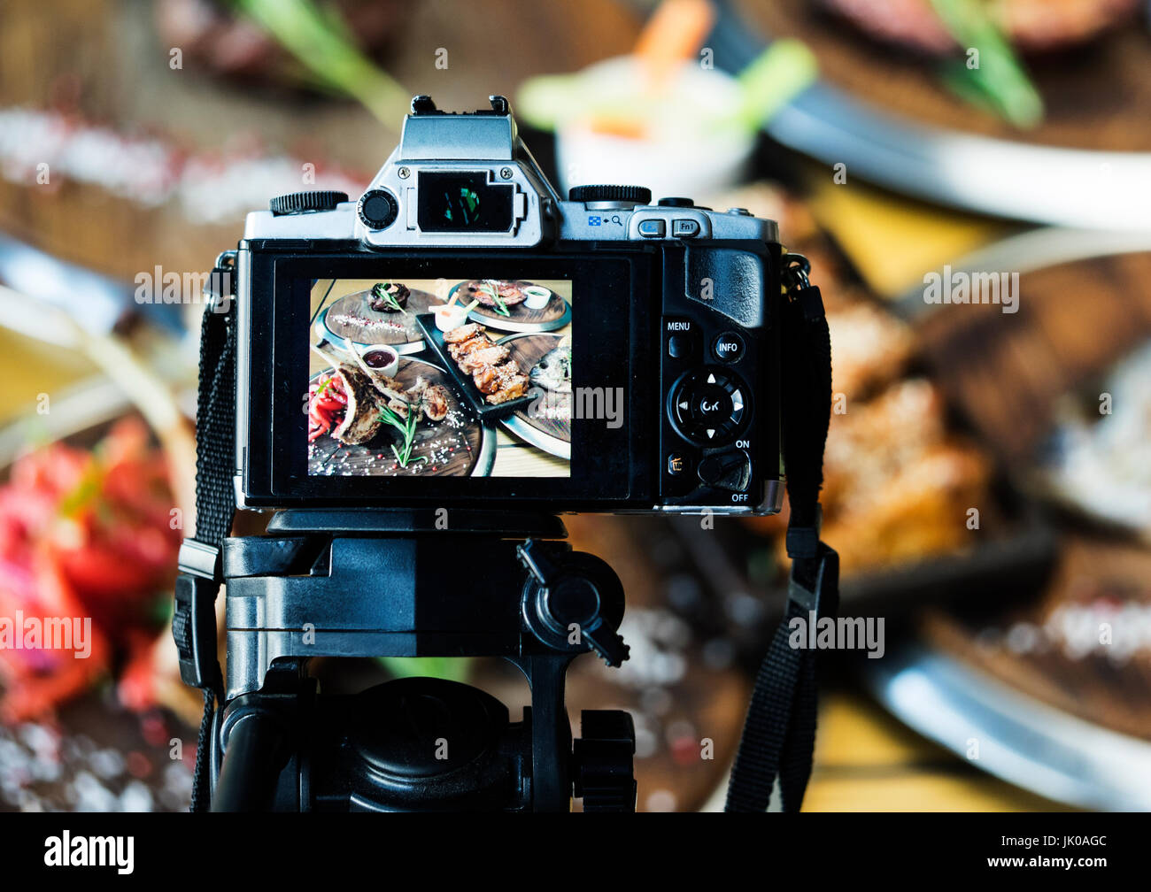 Photocamera shooting Fried barbecue and baked meat food Stock Photo - Alamy