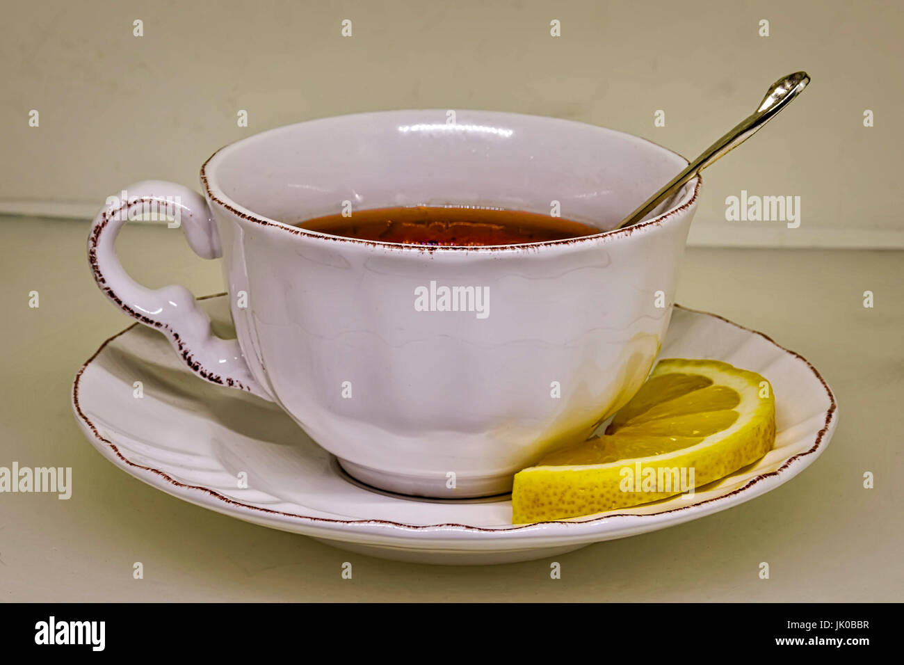 Tea cup with tea and a slice of lemon Stock Photo - Alamy