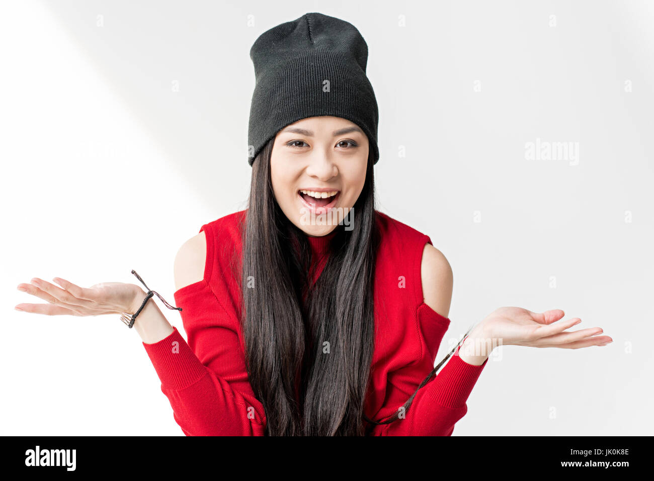 portrait of happy attractive asian woman with shrug gesture Stock Photo ...