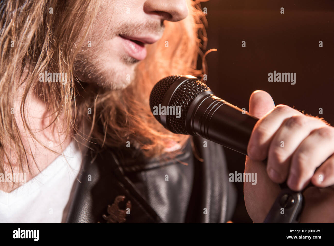 Male singer with microphone hi-res stock photography and images - Alamy