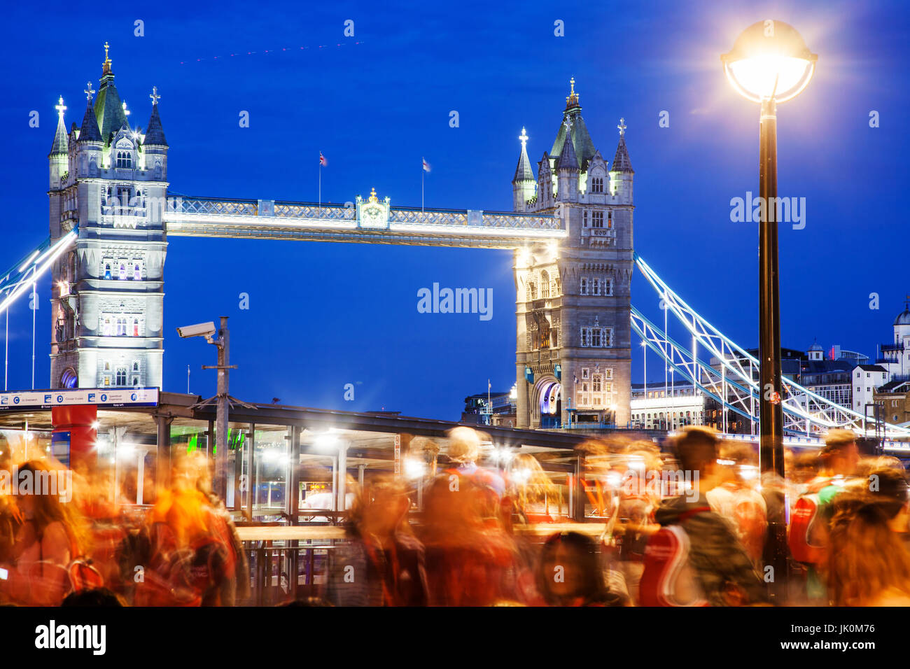LONDON, UK - JULY 17, 2017: crowd of tourists watching Tower Bridge in ...
