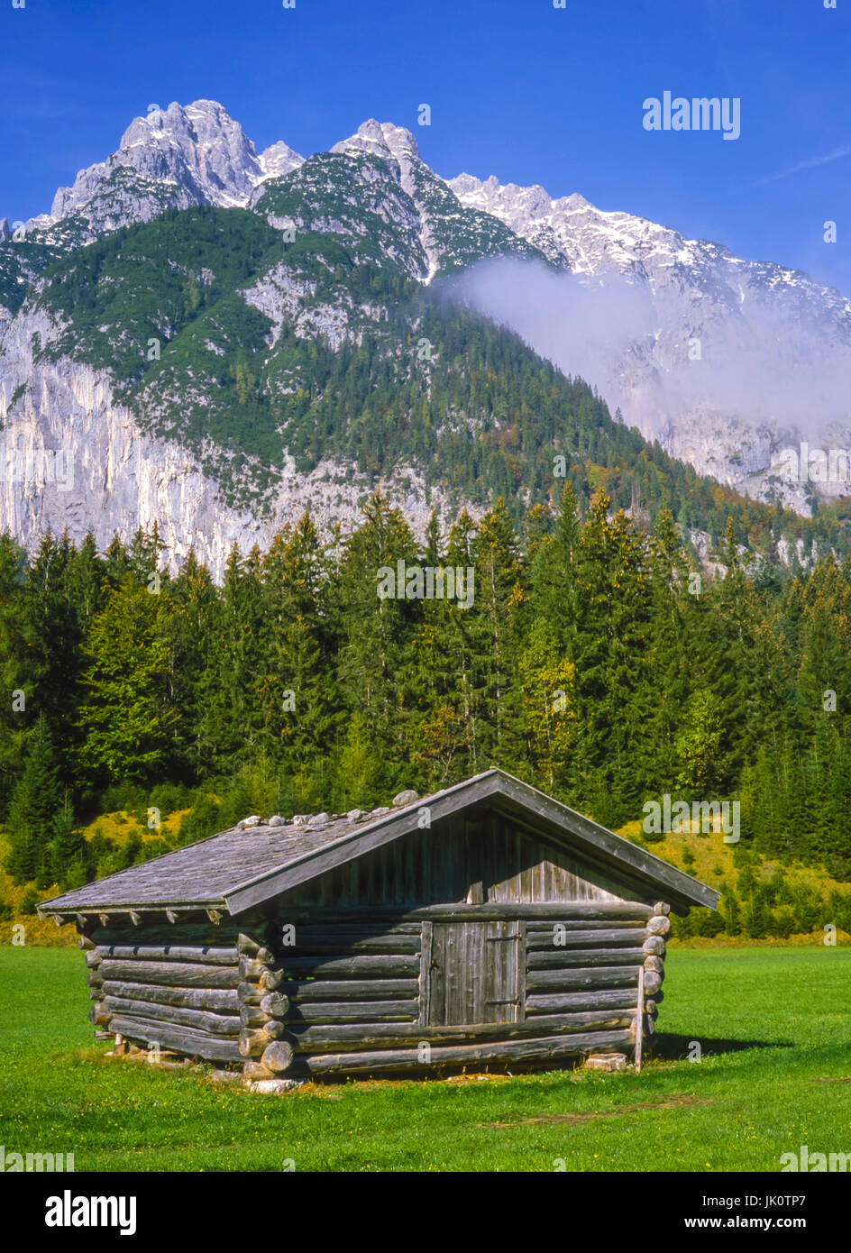 "traditionally from whole trunks of made hay stacks with shingle roof ...