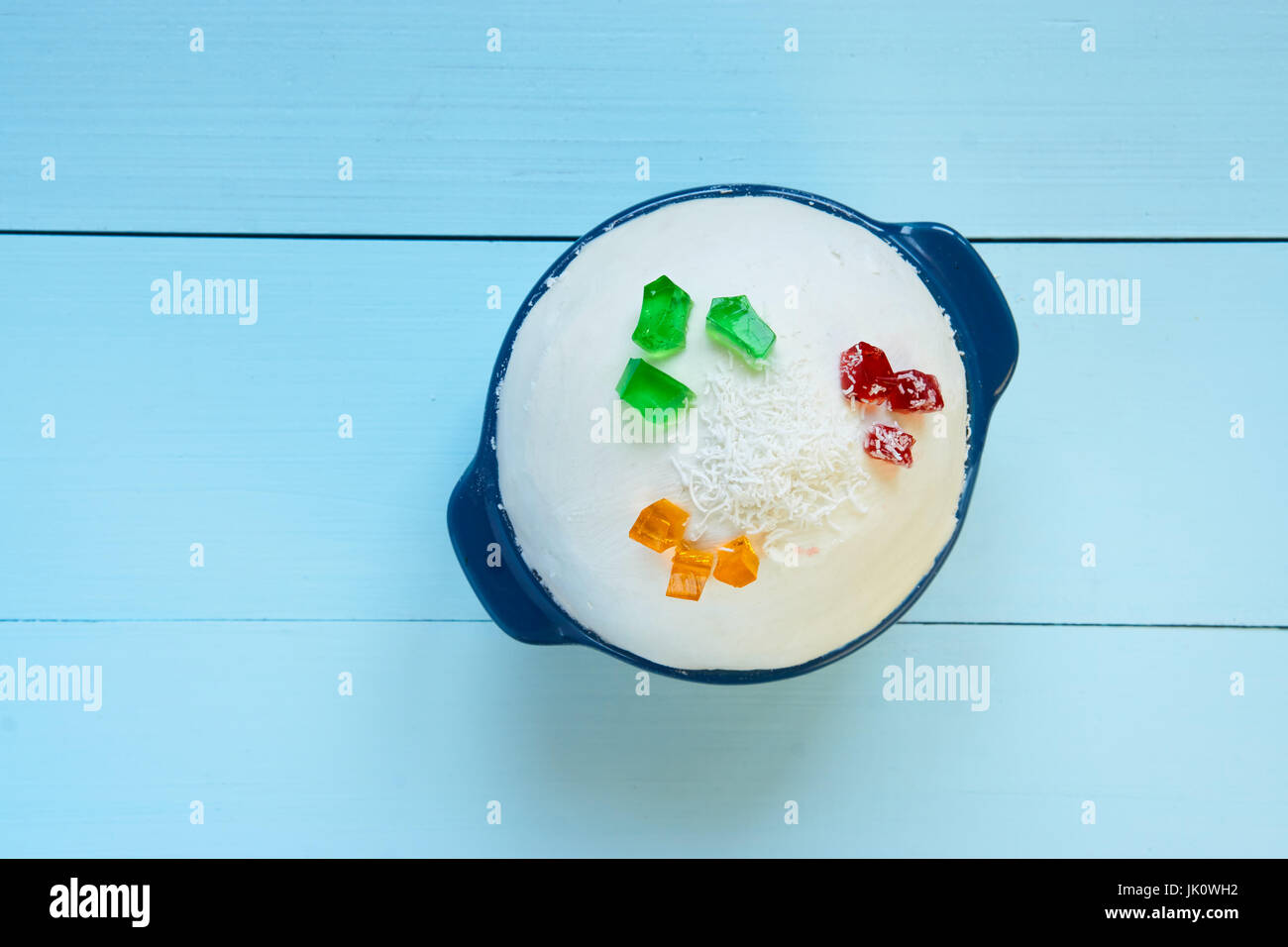 big ball of homemade gelato ice cream in ceramic bowl. with small vivid ...