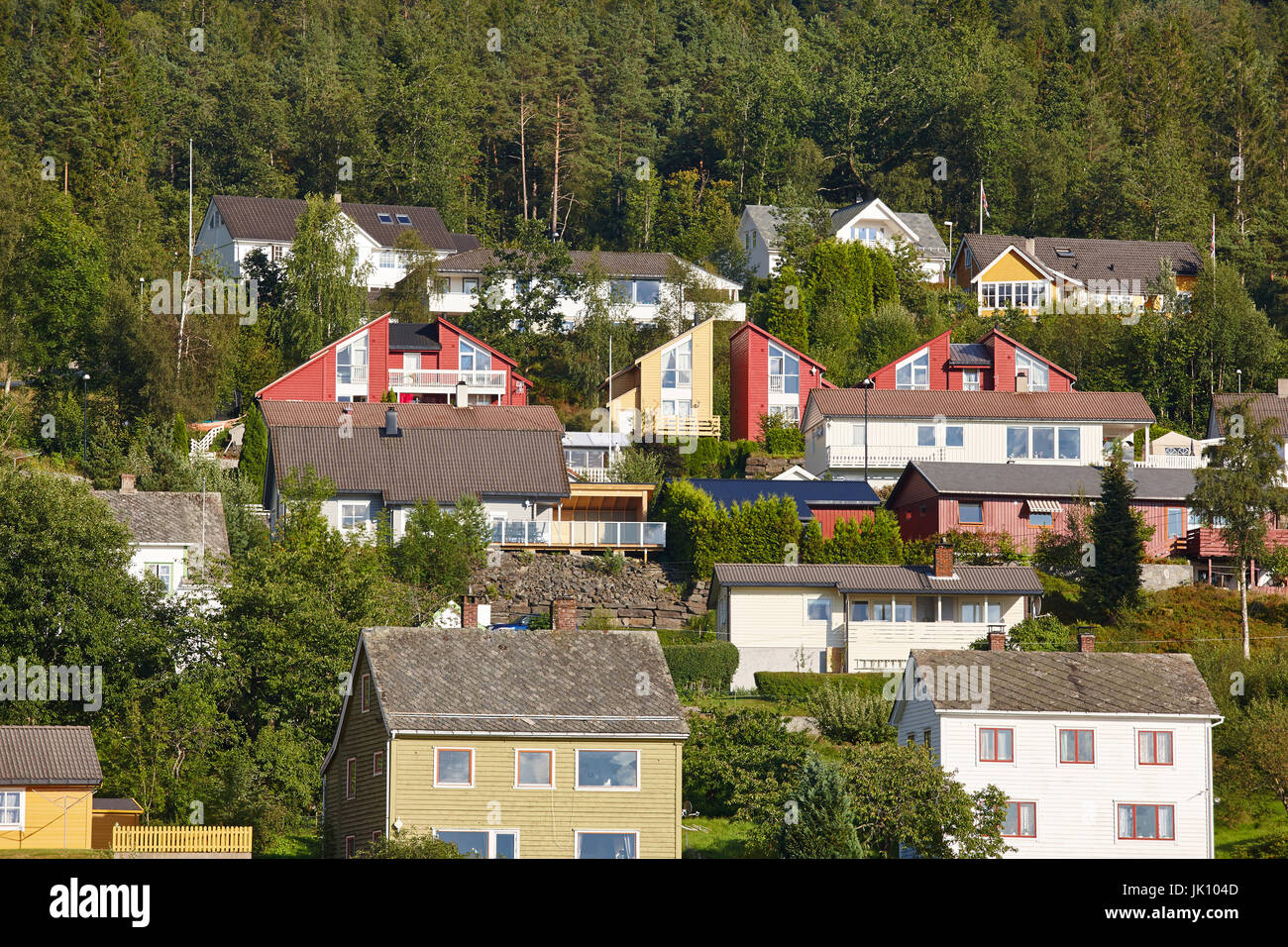Traditional norwegian fjord village with forest. Hardanger route ...