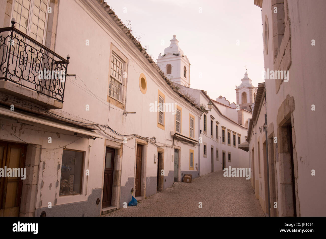 a alley in the old town in the city of Lagos at the Algarve of Portugal ...