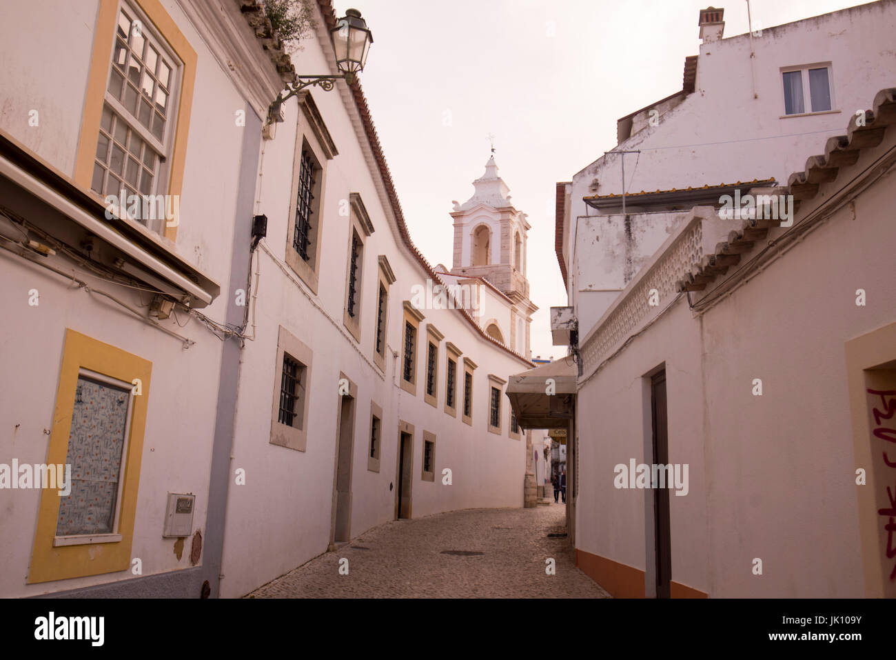 a alley in the old town in the city of Lagos at the Algarve of Portugal ...