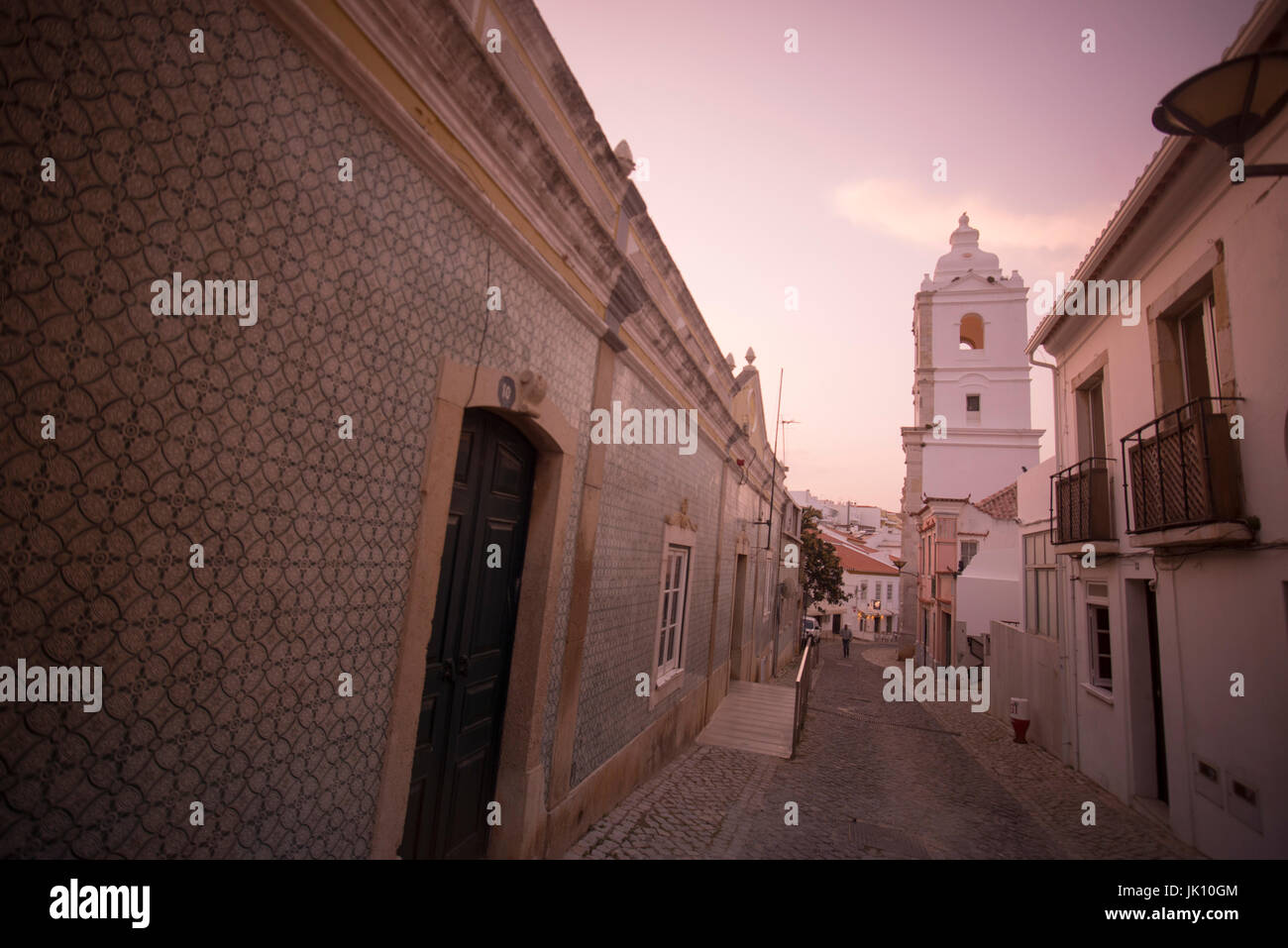 a alley in the old town in the city of Lagos at the Algarve of Portugal ...