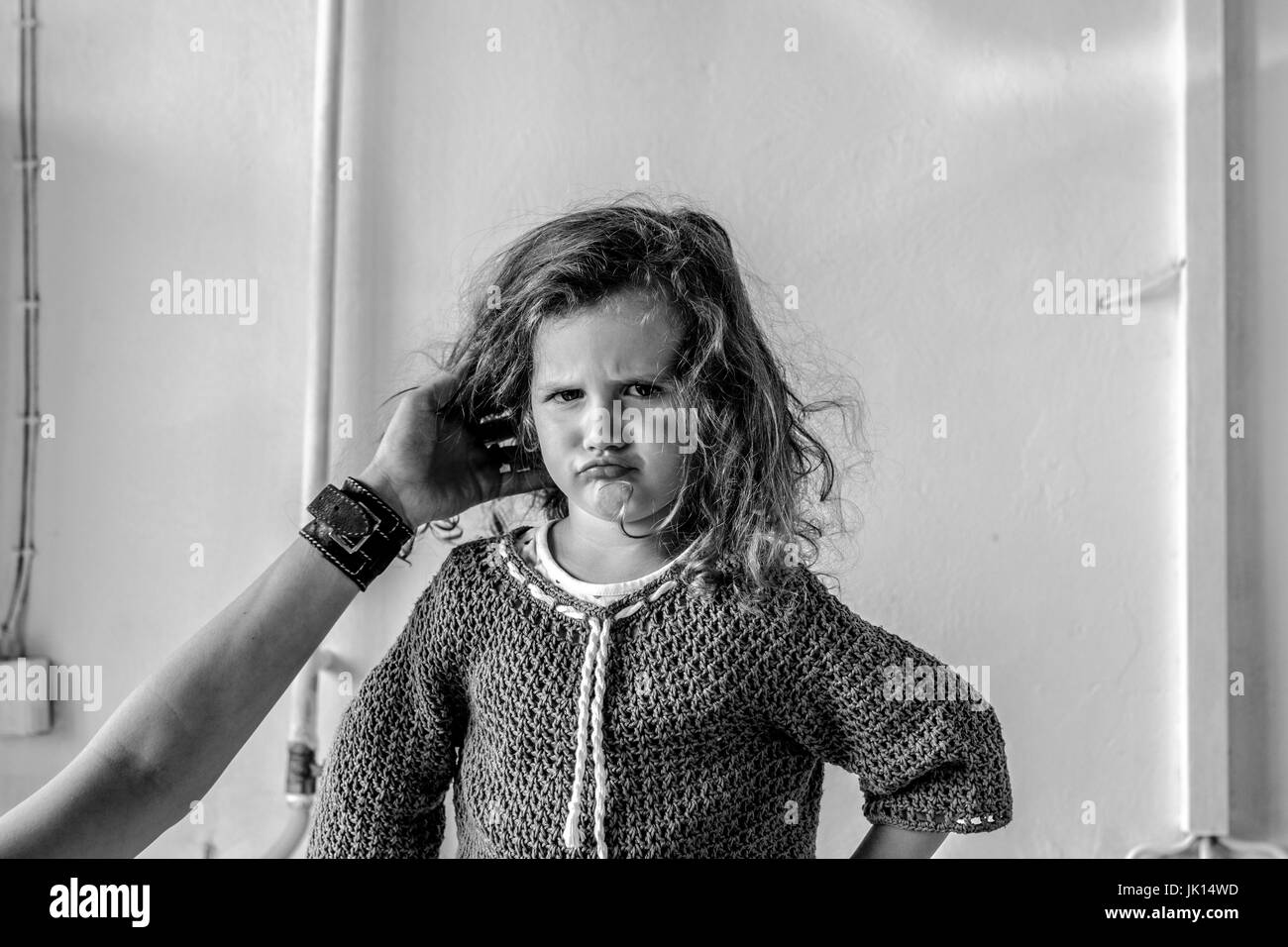Young girl making weird angry face at a fashion photoshoot Stock Photo ...