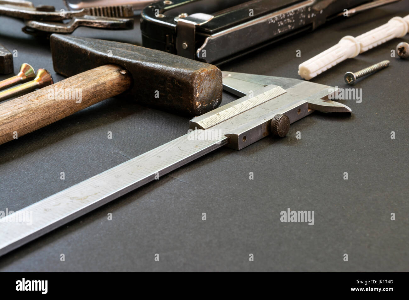 Tools on grey background. Copy space Stock Photo - Alamy